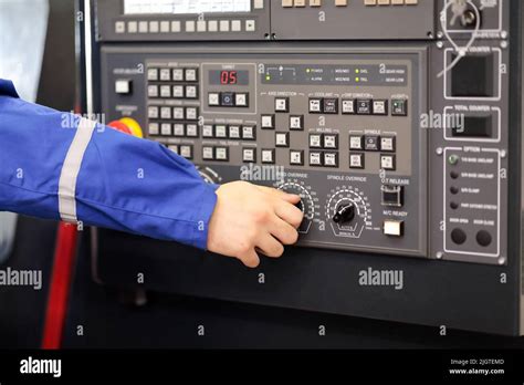 Worker Changes Feed Override Of CNC Lathe Machine Selective Focus Stock Photo Alamy