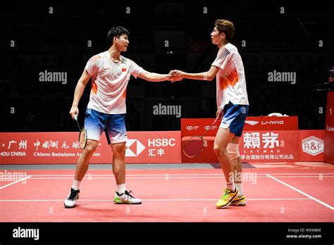 Li Junhui And Liu Yuchen Of China Celebrate After Scoring Against Hiroyuki Endo And Yuta
