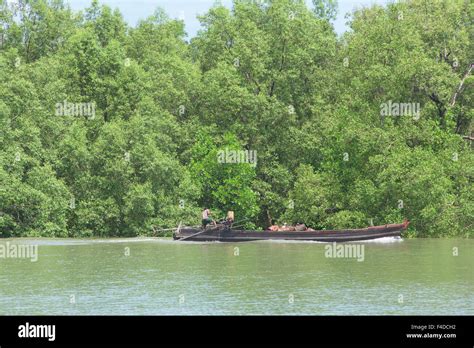 Small Traditional Cargo Vessel Transporting Wood Between Islands In The Tanintharyi Region Of