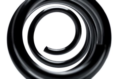 나선형 자동차 서스펜션 시스템 예비 부품 내의 코일 스프링 흰색 배경에 격리 된 내부의 철 물체 교체 부분 아무도 없습니다