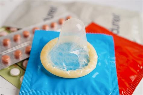 Premium Photo Condom And Birth Control Pills For Prevent Infection Safe Sex And Birth Control