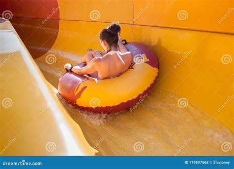 Young Woman In Bikini On A Rubber Inflatable Float Back On A Water