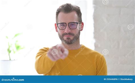 Portrait Of Man Pointing At The Camera Stock Photo Image Of Teamwork White