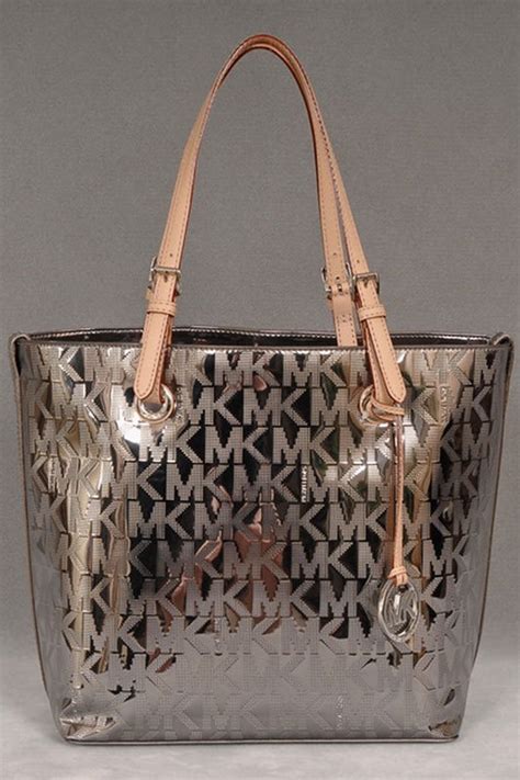 Michael Kors Mk Logo Mirror Metallic Grab Bag In Nickel Michael Kors Handbags Cheap Michael