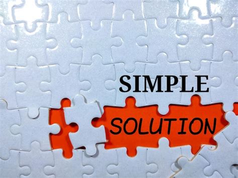 Premium Photo Selective Focusword Simple Solution On Puzzle With Red Backgroundbusiness Concept