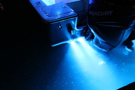 A Blue Light Shines On The Inside Of A Boat