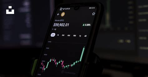 화면에 주식 차트를 표시하는 휴대폰 사진 Unsplash의 무료 암호 화폐 이미지