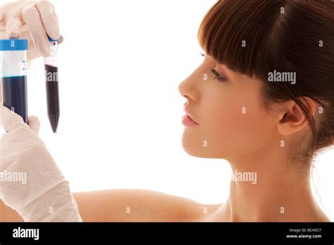 Beautiful Female Lab Worker Holding Up Test Tubes Stock Photo Alamy
