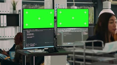 Database Developer Analyzing Greenscreen Display On Multiple Screens Technology Stock Footage