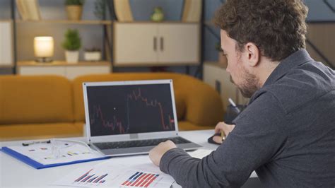 Man Analyzing Stock Market Charts 42967055 Stock Video At Vecteezy