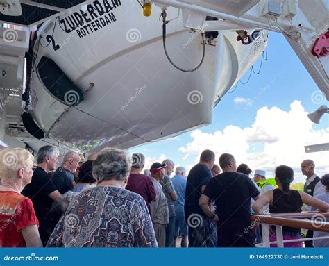 Muster Assembly Point Sign On A Wooden Wall Royalty Free Stock Image