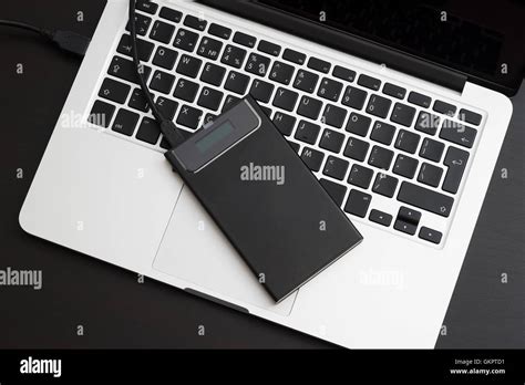 External Hard Disk Over Laptop Keyboard Stock Photo Alamy
