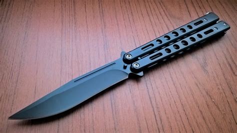 Ніж Метелик Складаний Чорний Високоякісна збірка фото відгуки характеристики в інтернет