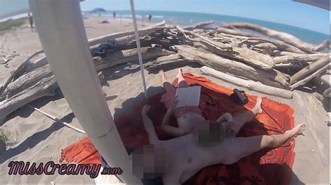Risky Public Handjob On The Canary Beach Caught Reading A Book