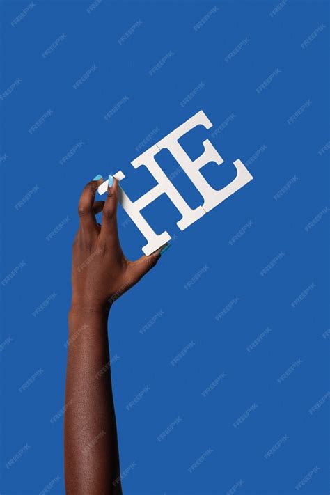 Free Photo Gender Fluid Person Holding A Pronoun Isolated On Blue