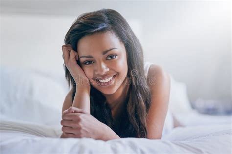 Woman Portrait And Happy On Bed In Home For Relax Lazy Day And Resting On Weekend With