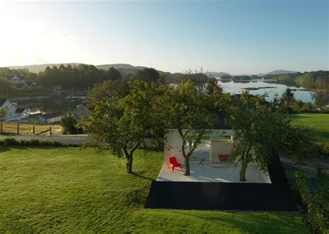 Wedge Shaped Cabin By Todd Saunders Punctured By A Terrace