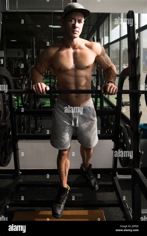 Muscular Man Resting After Exercises Portrait Of A Physically Fit