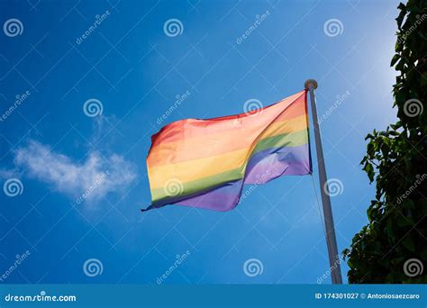 Lgbt Pride Flag Waving In The Blue Sky Stock Image Image Of People