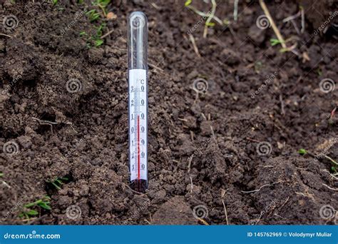 Measurement Using A Soil Temperature Thermometer In The Spring To Determine The Readiness Of The