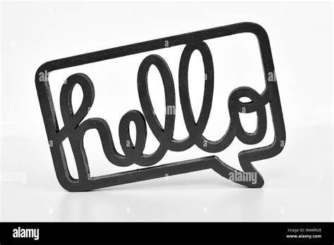 Black Wooden Sign With The Word Hello Written In Cursive Letters On White Background Stock
