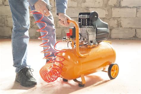 The Compressor Is Portable Using A Portable Compressor At Work Stock Image Image Of Industry