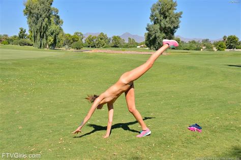 Fit Brunette Doing Some Exercise Completely Naked In Public