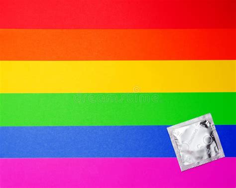 Condom On Lgbt Rainbow Flag Background Protected And Safe Sex Concept Flat Lay Top View Copy