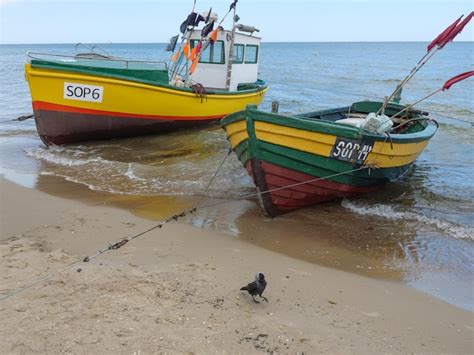Premium Photo Beach With Boats In Poland