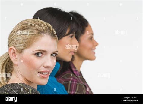 Three Women In A Row Stock Photo Alamy