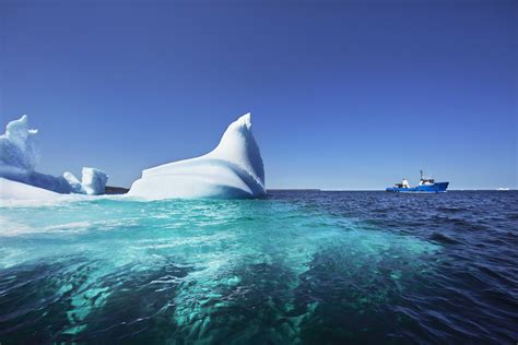 Dark Water Surrounds An Iceberg Off Bonavista Newfoundland R