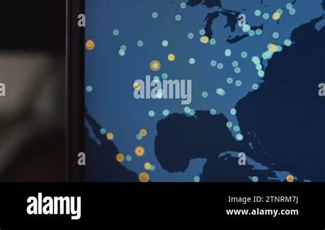 Criminal Hacker Using Computer Pointing To A World Map For Organizing Global Massive Data Breach