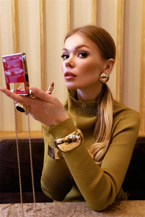 Beautiful Slavic Woman With Blond Hair In Elegant Dress And Accessories