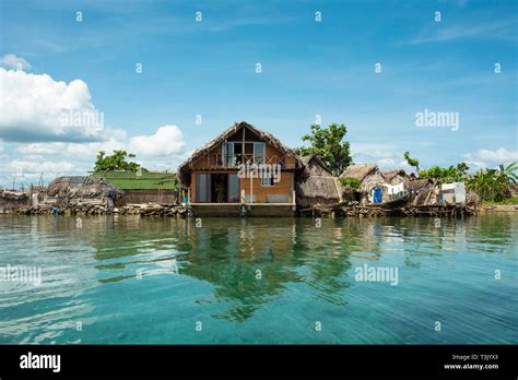 Waterfront View Of Kuna Traditional Housing Rural Thatched Houses Or
