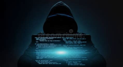 Hacker In Hoodie Typing Code On A Glowing Laptop In Darkness Symbolizing Cyber Threats Hacking