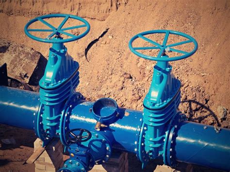 Gate Valves Underground Water Pipeline Valve On A Blue Pipeline After Reconstruction Stock