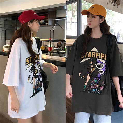 เสื้อโอเวอร์ไซส์ผู้หญิง เสื้อยืดแขนสั้นเกาหลี เสื้อผ้าวัยรุ่นแฟชั่น เสื้อยืดหลวมคอกลม ลายการ์ตูน