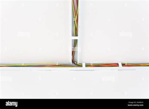 Exposed Colourful Cables On Electrical Wire Casing Base For Rewiring
