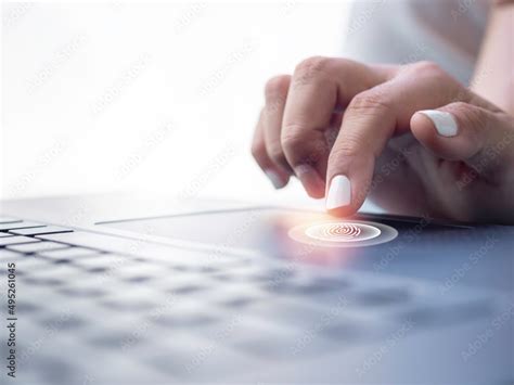 Fingerprint Scan Icon On Touchpad On Laptop Computer While Finger Scanning For Security Access