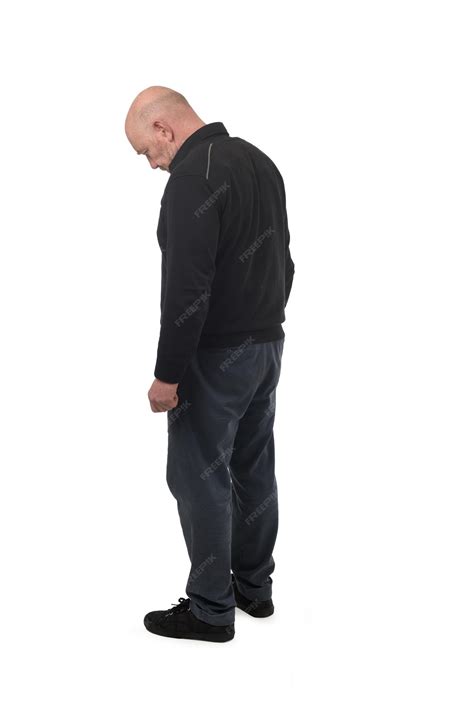 Premium Photo Side View Of A Man Looking Down On White Background