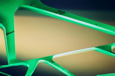 Premium Photo Modern Triangle Bulb With The Steel Frame On The