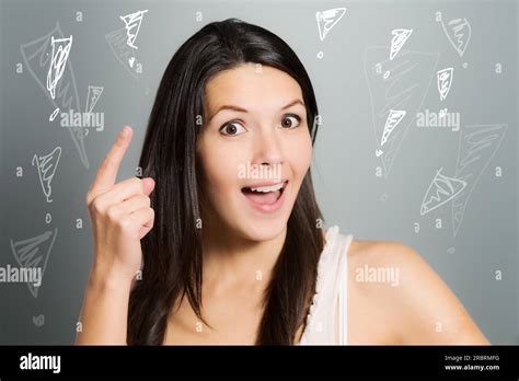 Attractive Young Woman Signaling With Her Index Finger That She Has