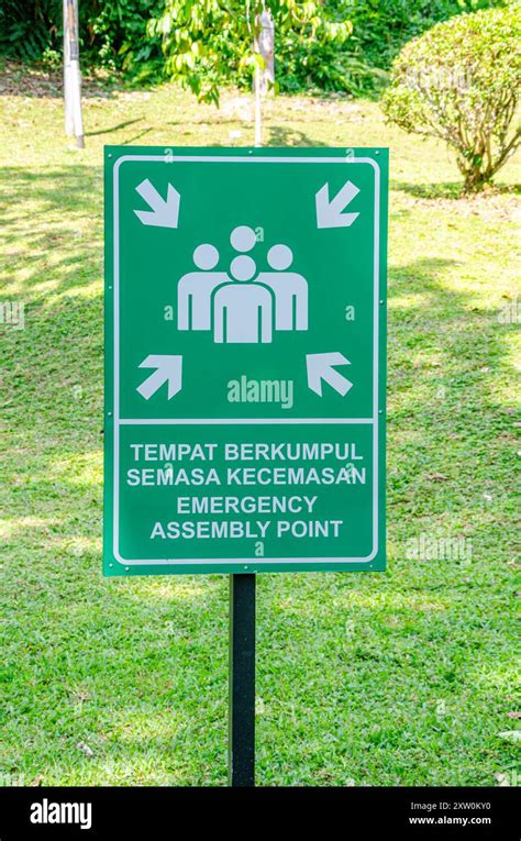 A Sign Denoting An Emergency Assembly Point In Penang Botanical Gardens