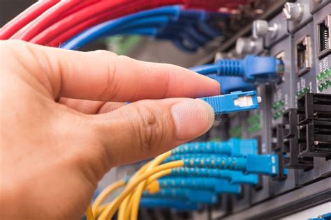 Man Connecting Fiber Network Cables Stock Photo Image Of Center Electronic