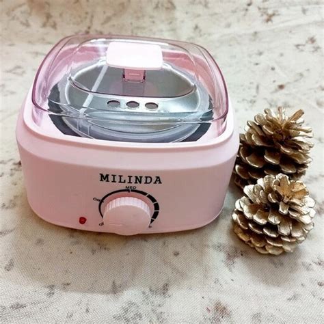 خرید و قیمت دستگاه شمع و موم گرم کنمیلندا وکس و پاکسازی صورت و بدن