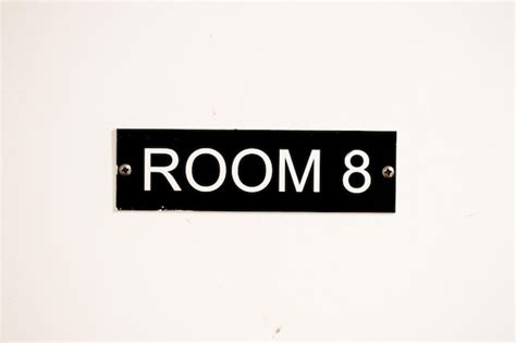 Premium Photo Close Up Of Room Number On Door