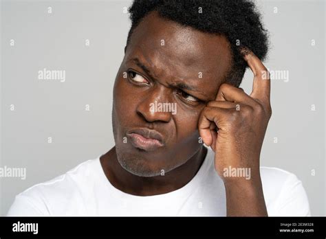 Unsure Doubtful Black Man Scratching Head Looking Left Doubtfully