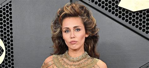 Miley Cyrus Goes Braless In A Chic Coat For New Photoshoot