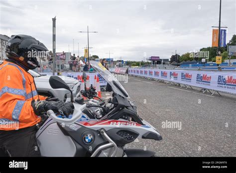 A Motorbike Support Rider At The 2023 Uci Cycling World Championships