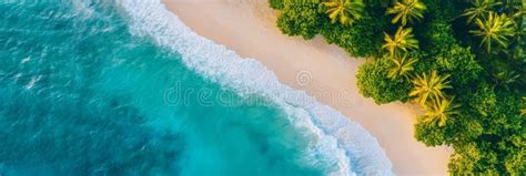Aerial View Of A Tropical Paradise With Turquoise Ocean Waves Gently
